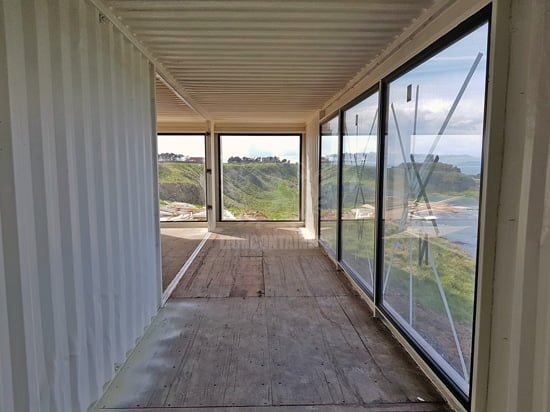 Cladded Coastal Shipping Container Café - Lion Containers Ltd