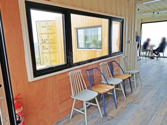 Cladded Coastal Shipping Container Café - Lion Containers Ltd